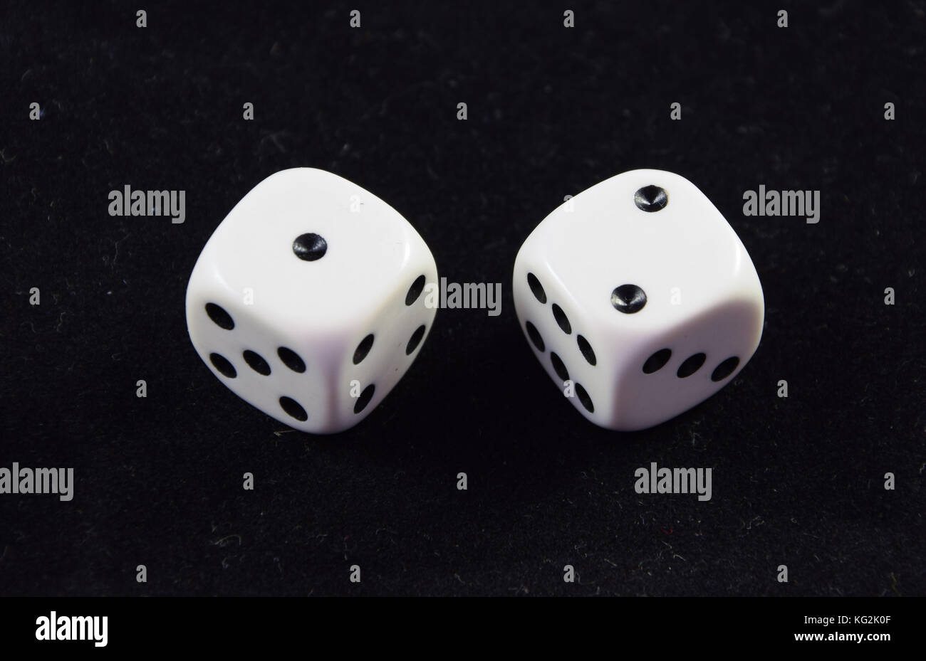 A pair white of dice showing Two and one Stock Photo - Alamy