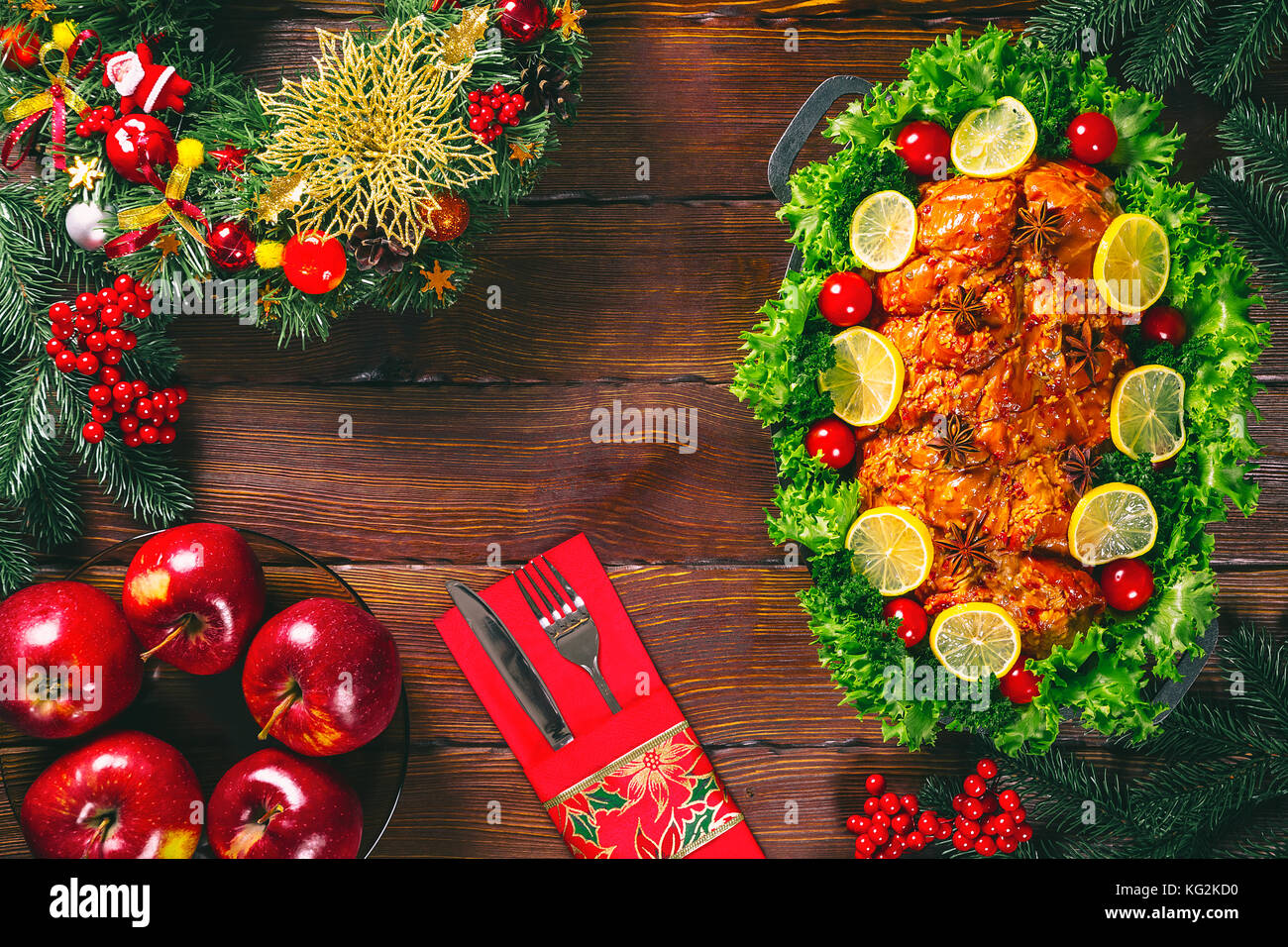 Christmas table dinner time with roasted meats decorated in Christmas ...