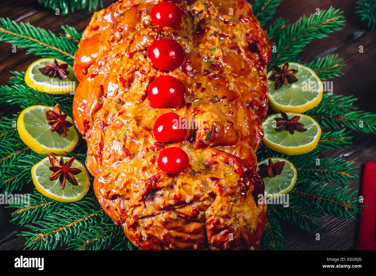 Christmas table dinner time with roasted meats, candles and New Year ...