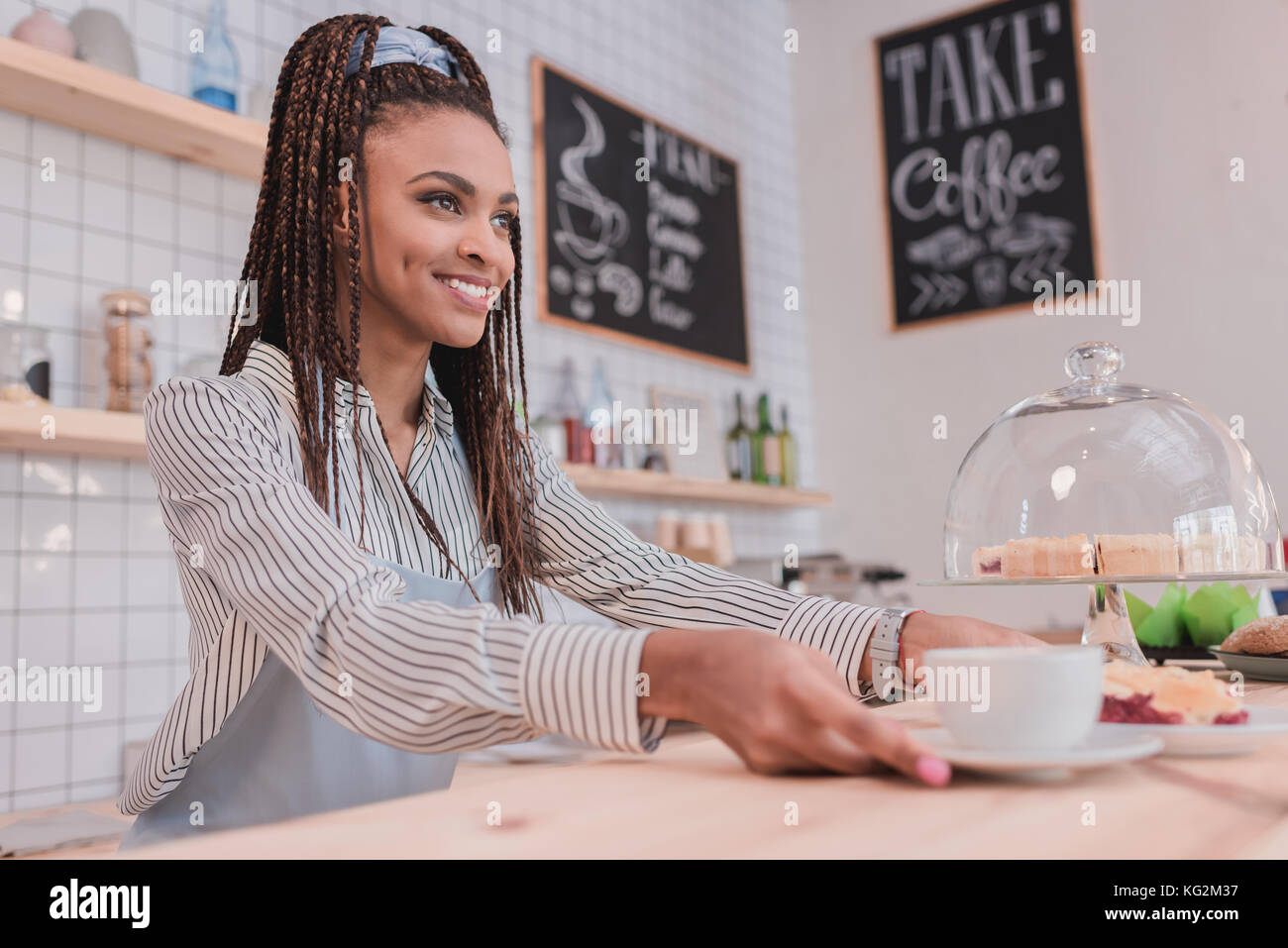 barista serving order to client Stock Photo - Alamy