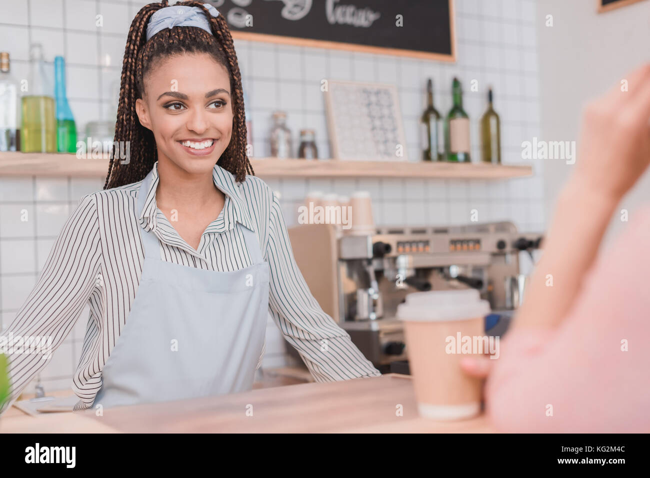 barista standing behind counter Stock Photo - Alamy