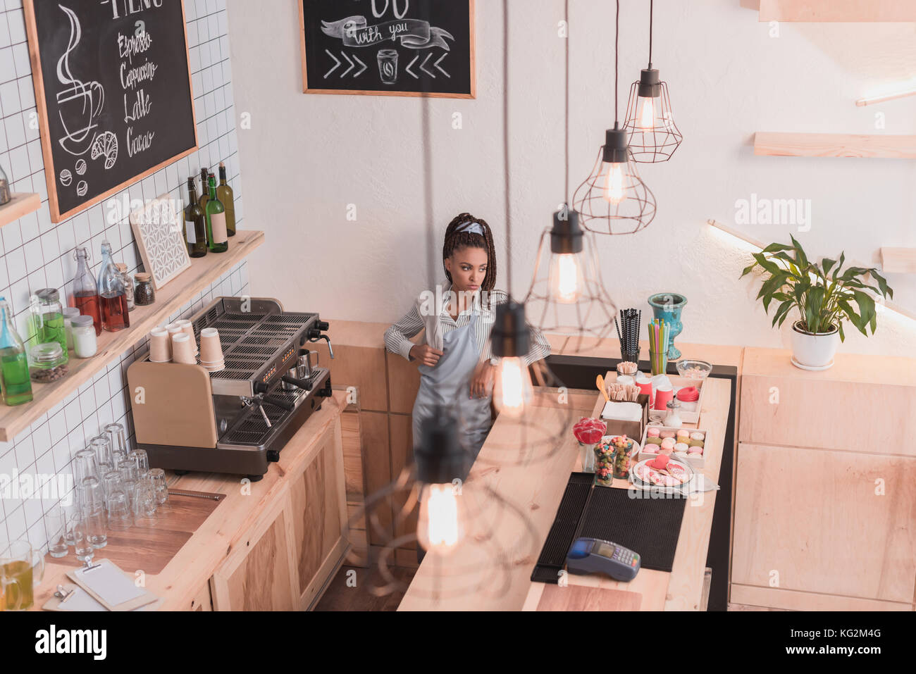 barista standing behind counter Stock Photo - Alamy
