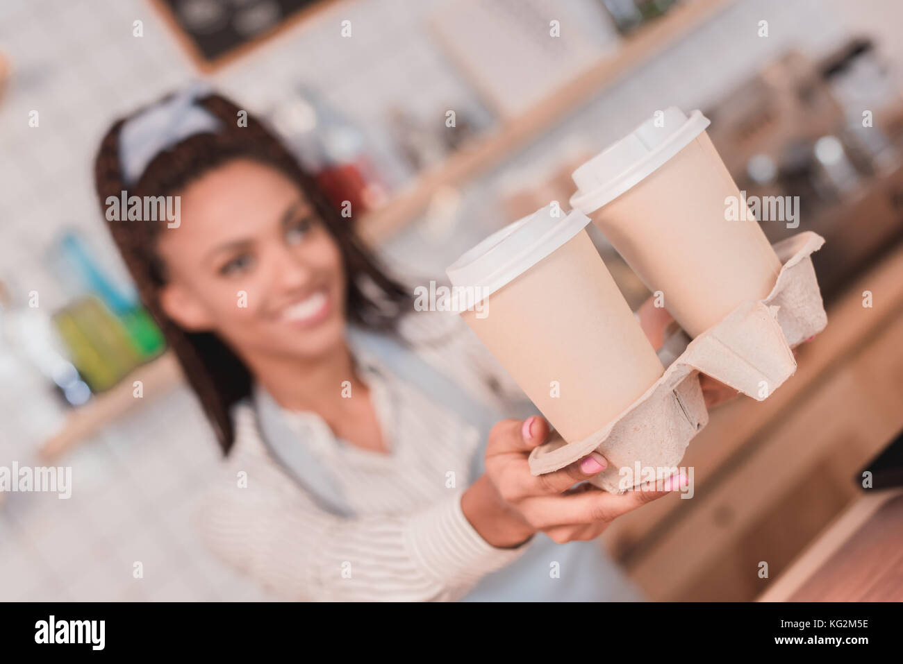Handing out coffee hi-res stock photography and images - Alamy