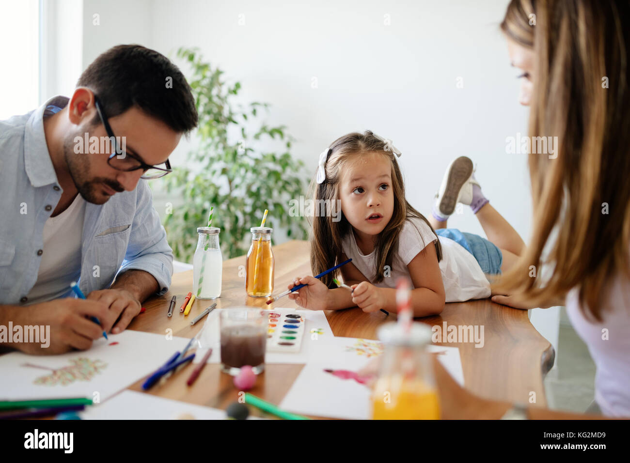 Happy familiy spending fun time at home Stock Photo - Alamy
