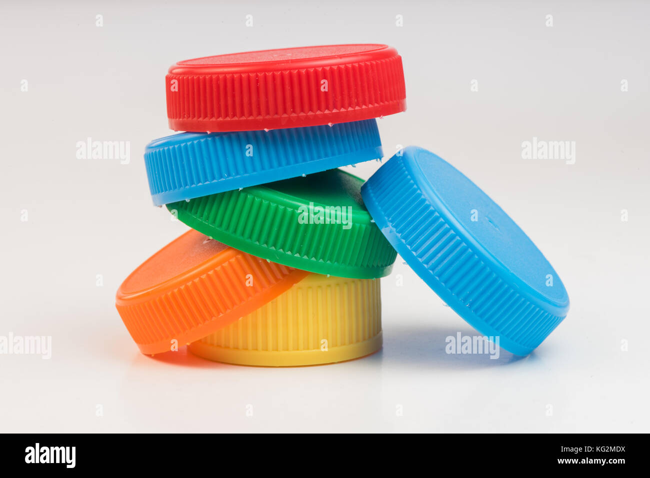 Plastic bottle screw caps isolated on white background Stock Photo - Alamy