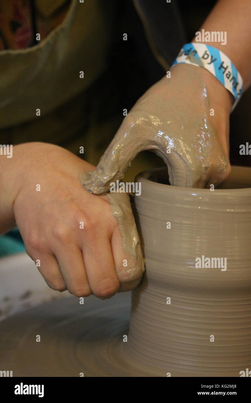 Visitors having a go at pottery at Cardiff's 2017 Made By Hand Pottery ...