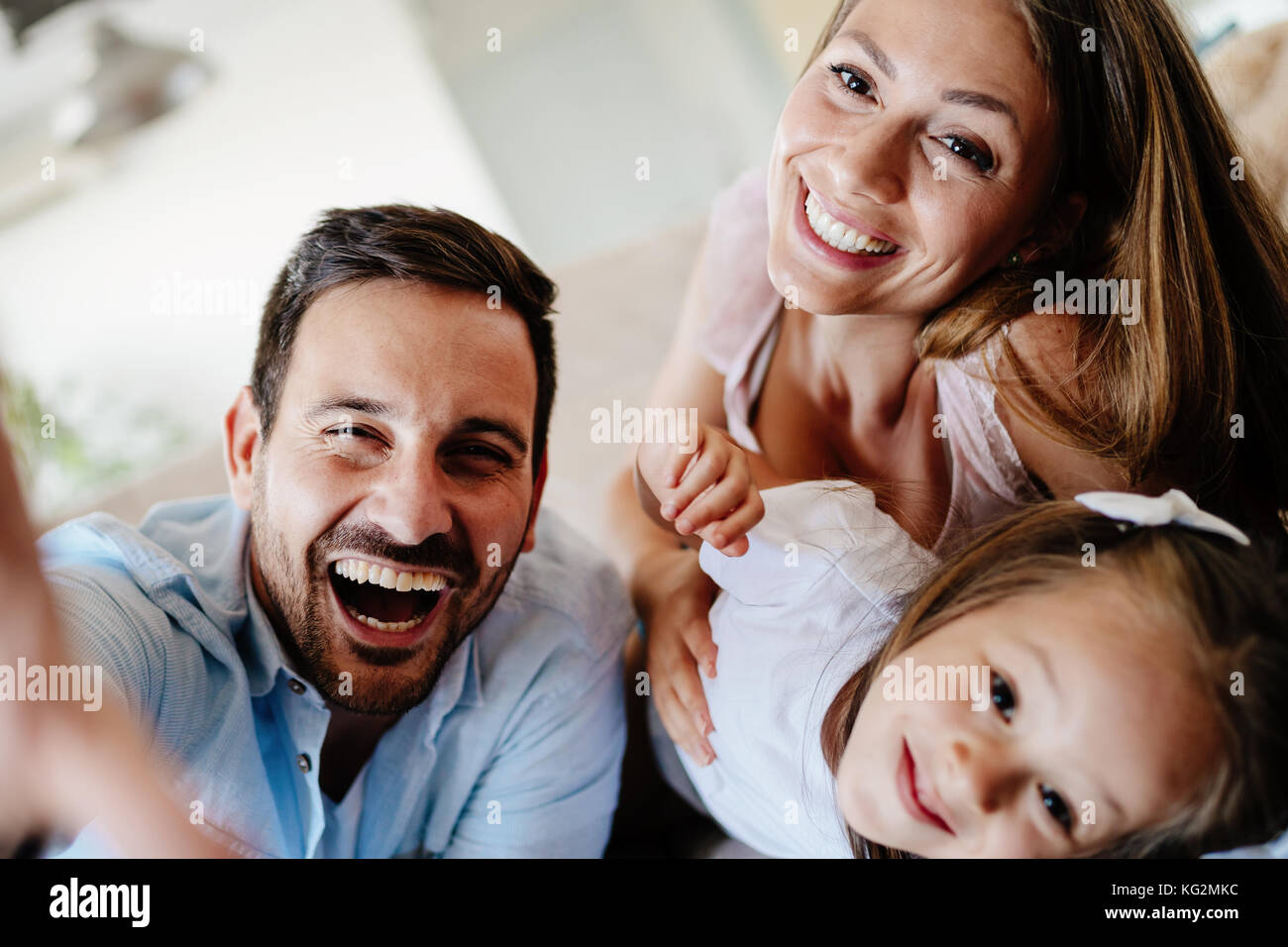 happy family with camera taking picture Stock Photo - Alamy