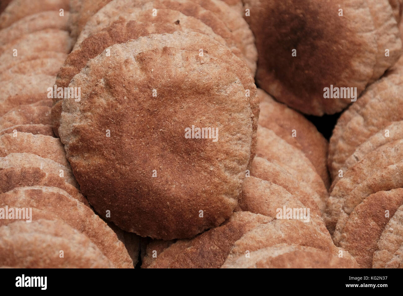 Pile of traditional Pita or Pitta bread which is a soft, slightly ...