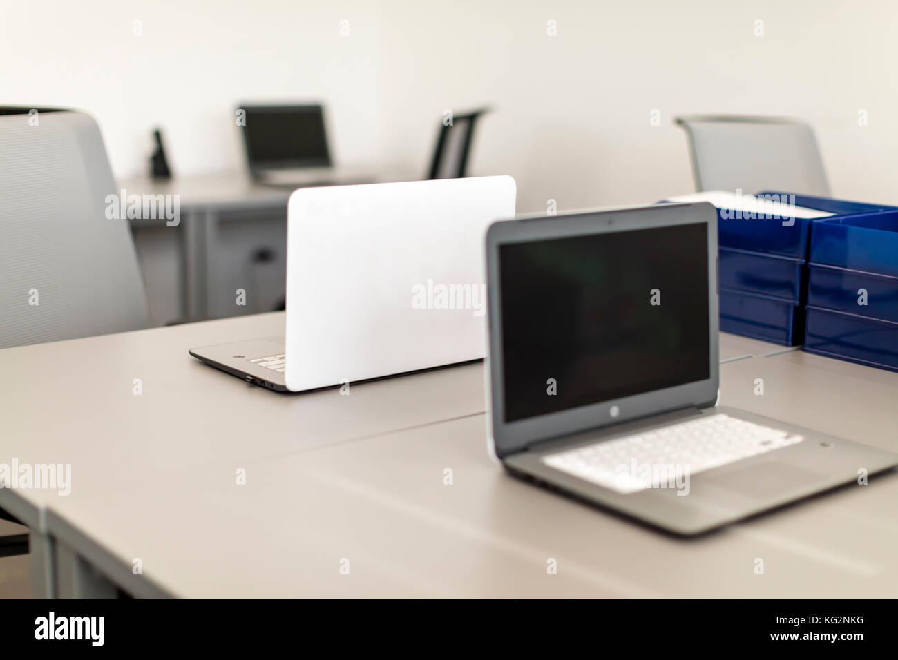 Modern office, close-up on work desk with laptop Stock Photo - Alamy