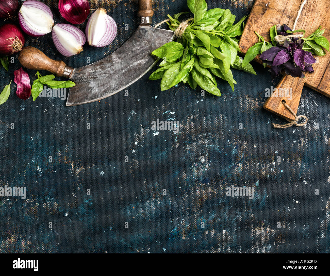 Healthy food cooking background over grunge dark blue plywood texture ...
