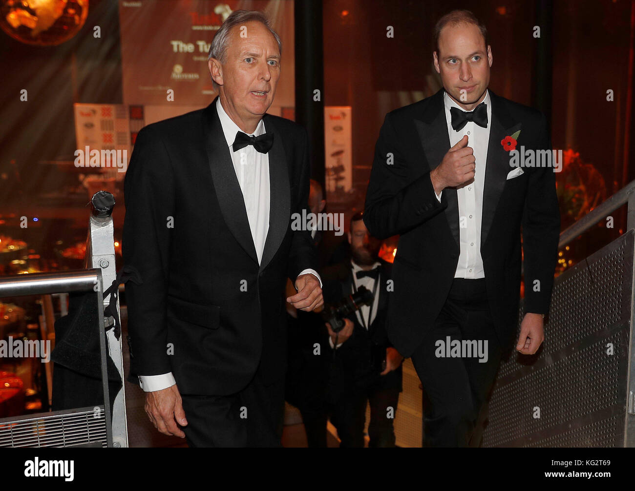 The Duke of Cambridge, right, arrives with CEO Charlie Mayhew at a gala ...