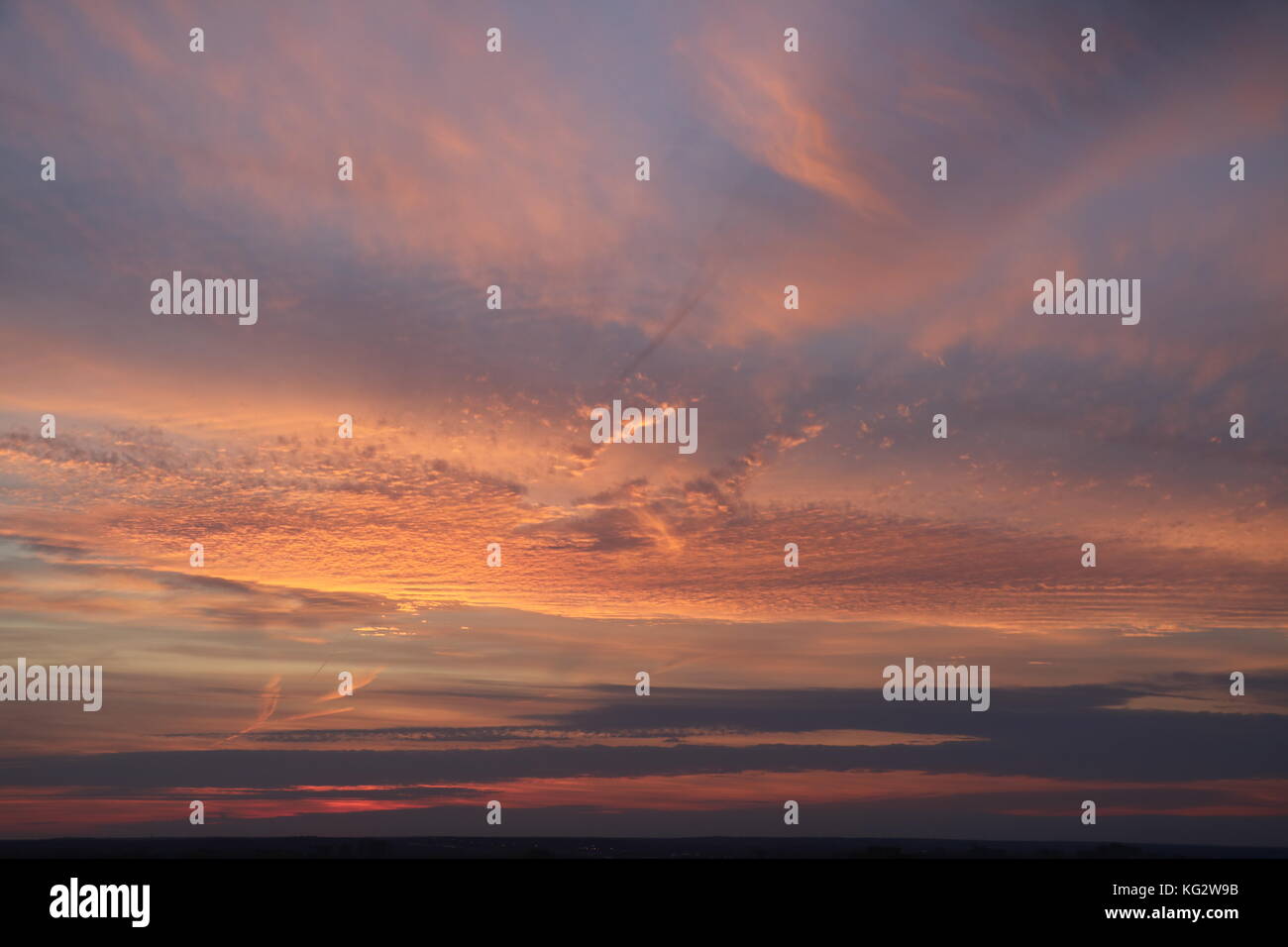 Sunset and colorful clouds Stock Photo - Alamy