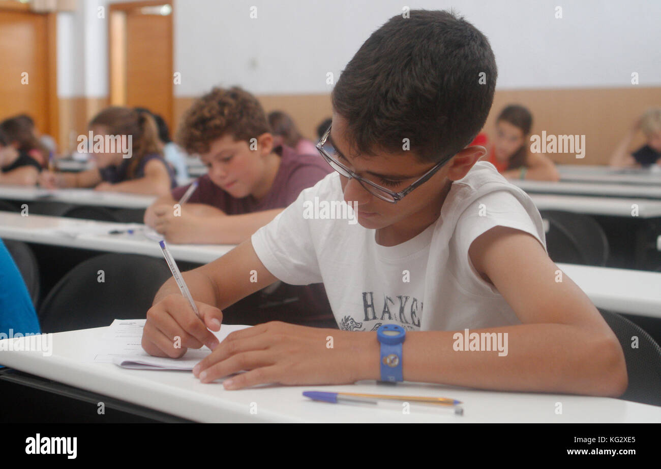 Childrens in an exam. During a mathematics test organized by the ...