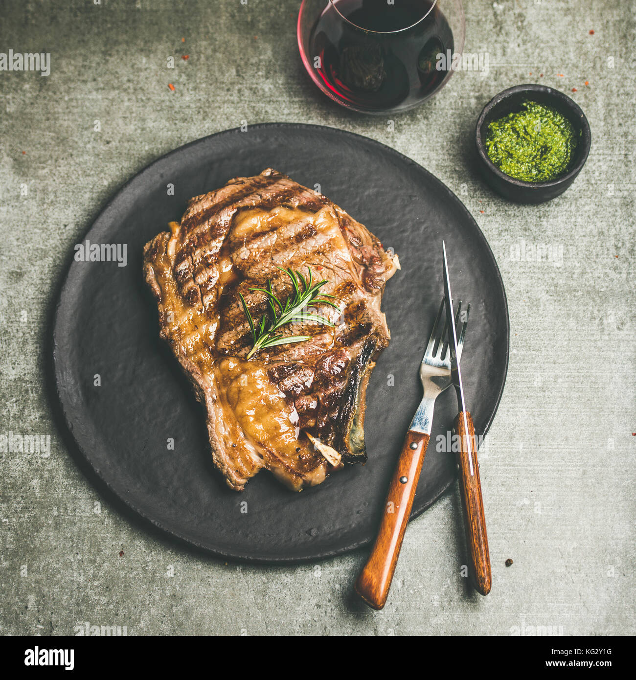 Grilled hot rib-eye beef steak with red wine, square crop Stock Photo ...