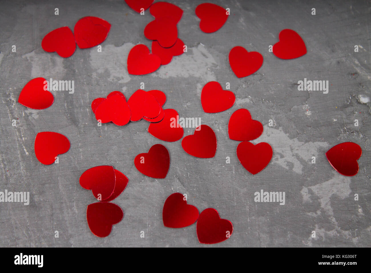 Red hearts on grey background. Marble background Stock Photo - Alamy