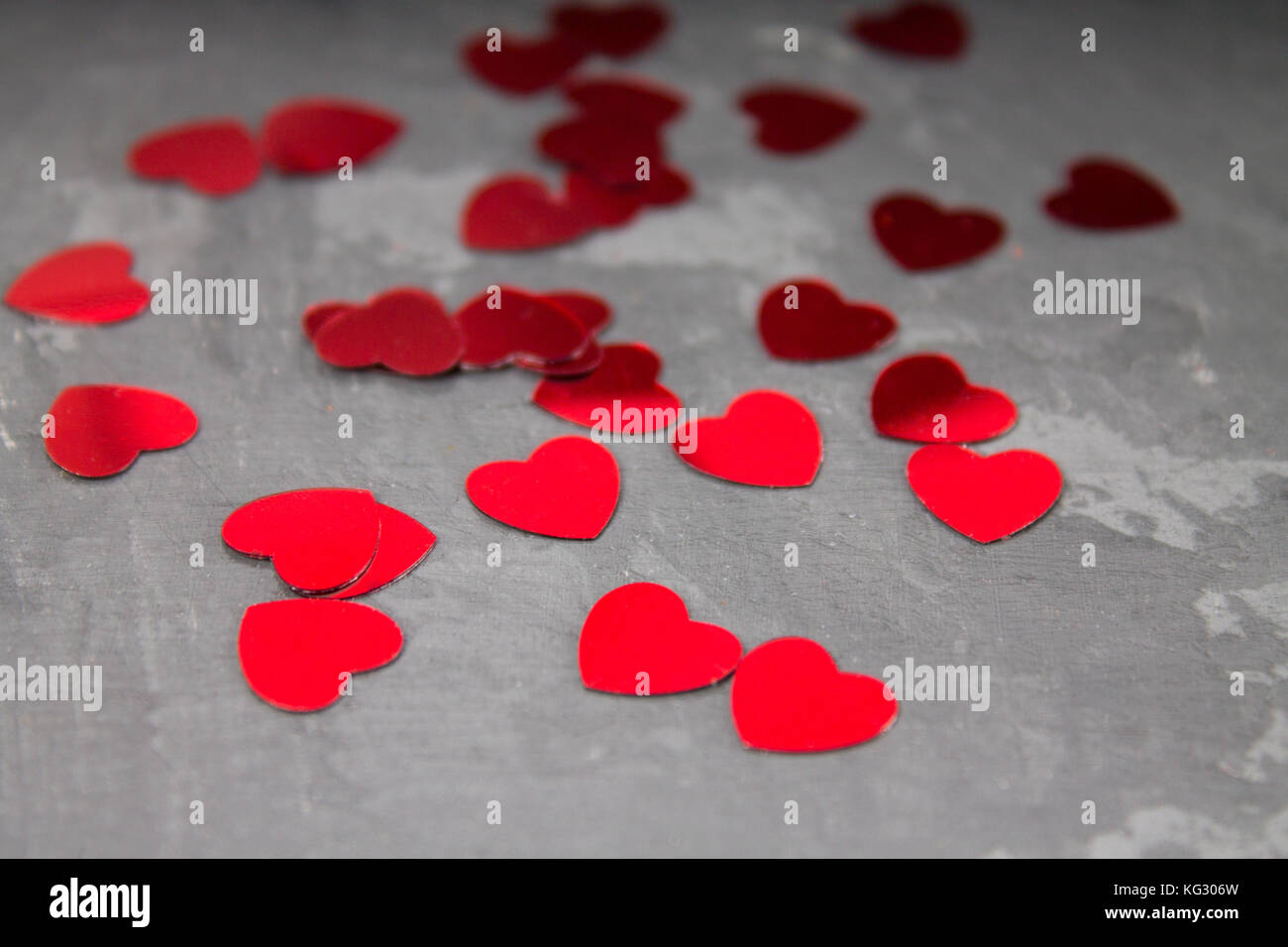Red hearts on grey background. Marble background Stock Photo - Alamy