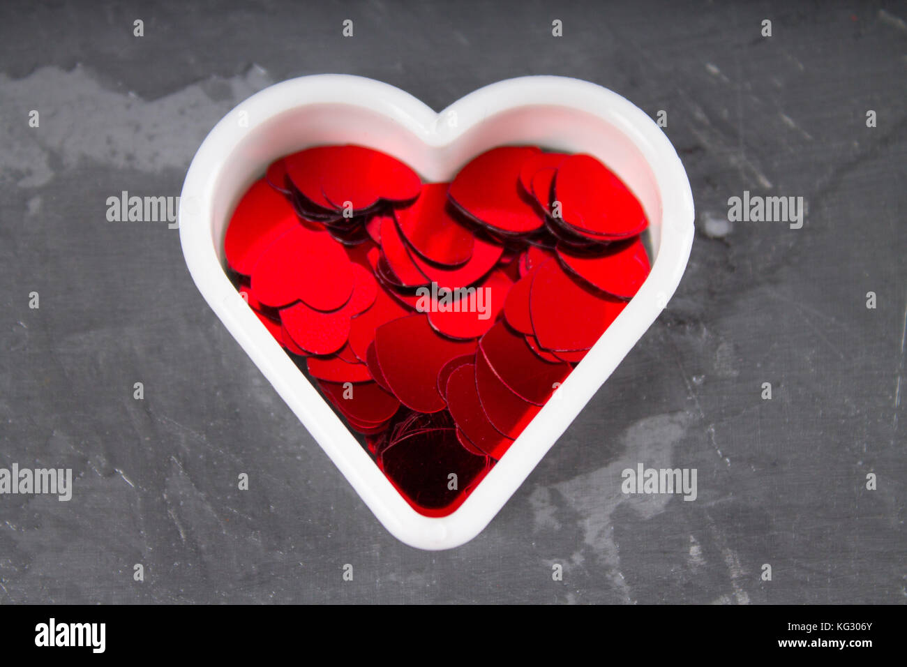 Red hearts on grey background. Marble background Stock Photo - Alamy