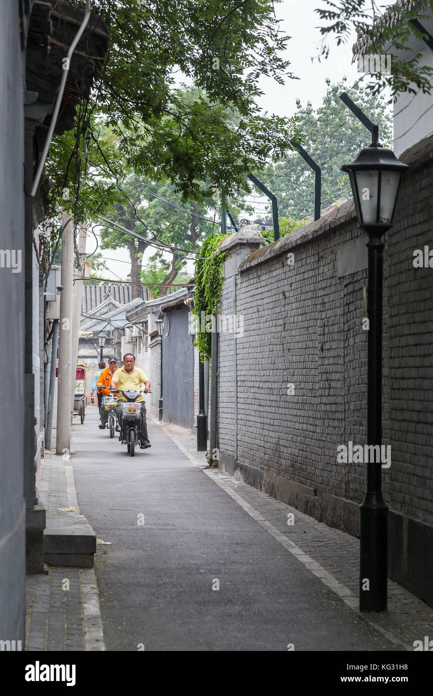 Old narrow streets of traditional hutongs in Beijing, China Stock Photo ...