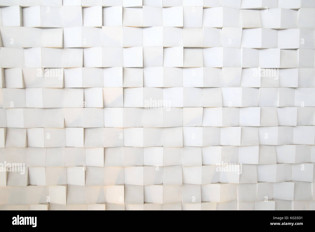 White wall with uneven Square pattern block background Stock Photo - Alamy