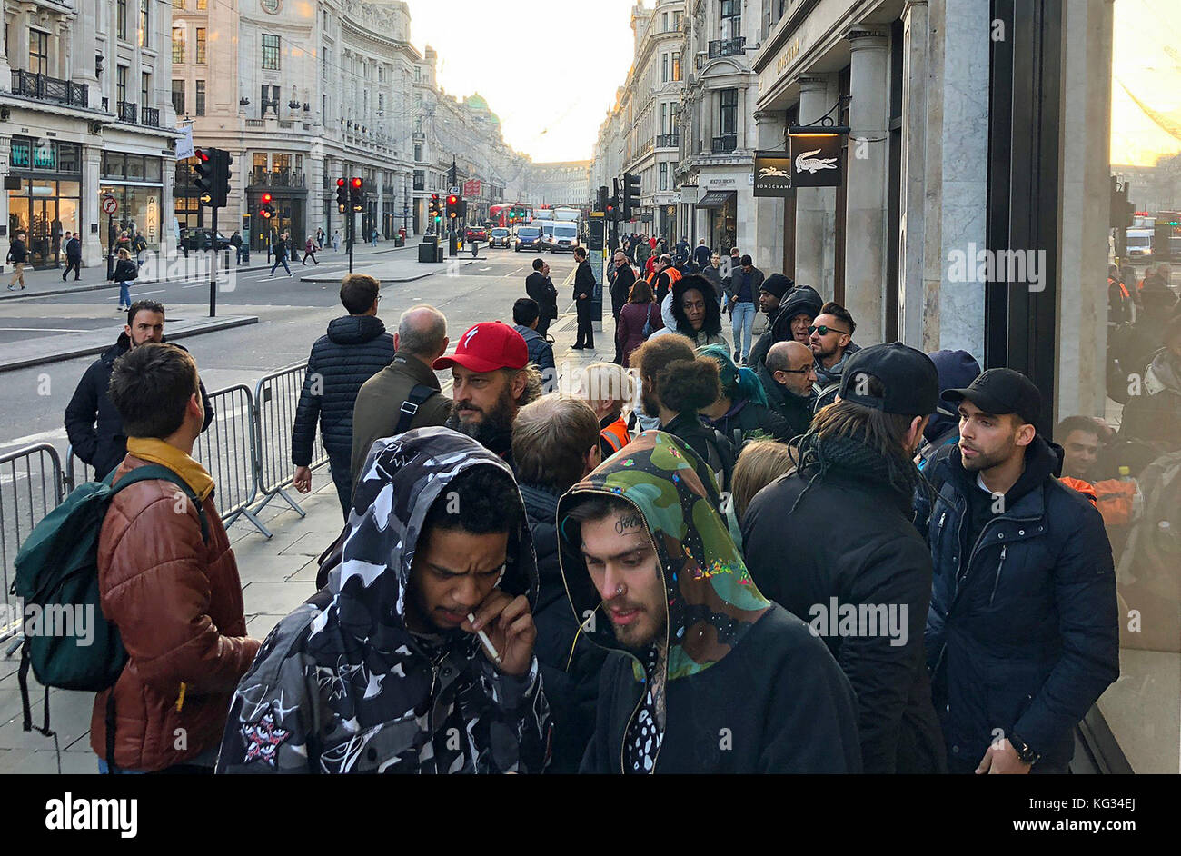 People queuing outside the apple store on regent street hi-res stock ...