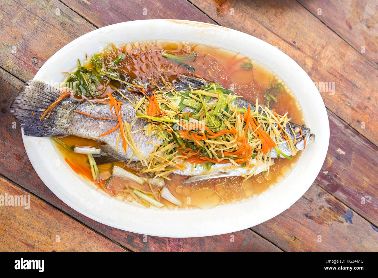 Snapper steamed in soy sauce, Thai food Chinese style Stock Photo - Alamy