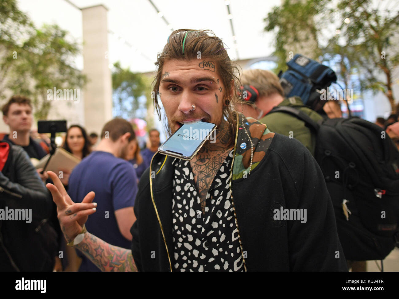 Marco Pierre White Jr holds his new iPhone X outside the Apple Store on ...