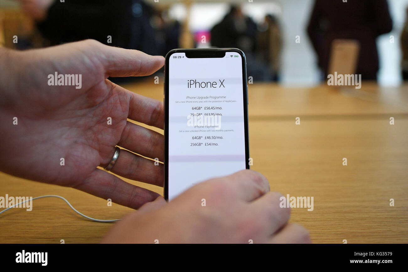 An iPhone X on display in the Apple Store on Regent Street, London, as ...