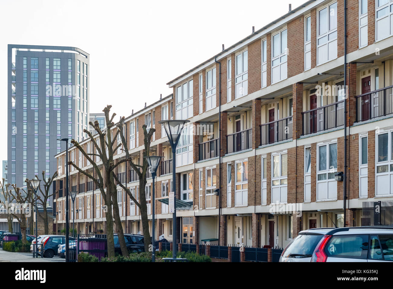 English terraced houses in contrast to modern luxury flats in the ...