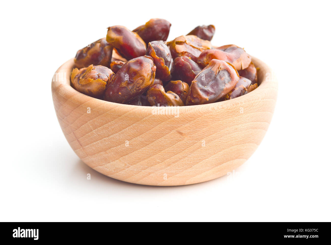 Sweet dates without stones in bowl isolated on white background Stock ...