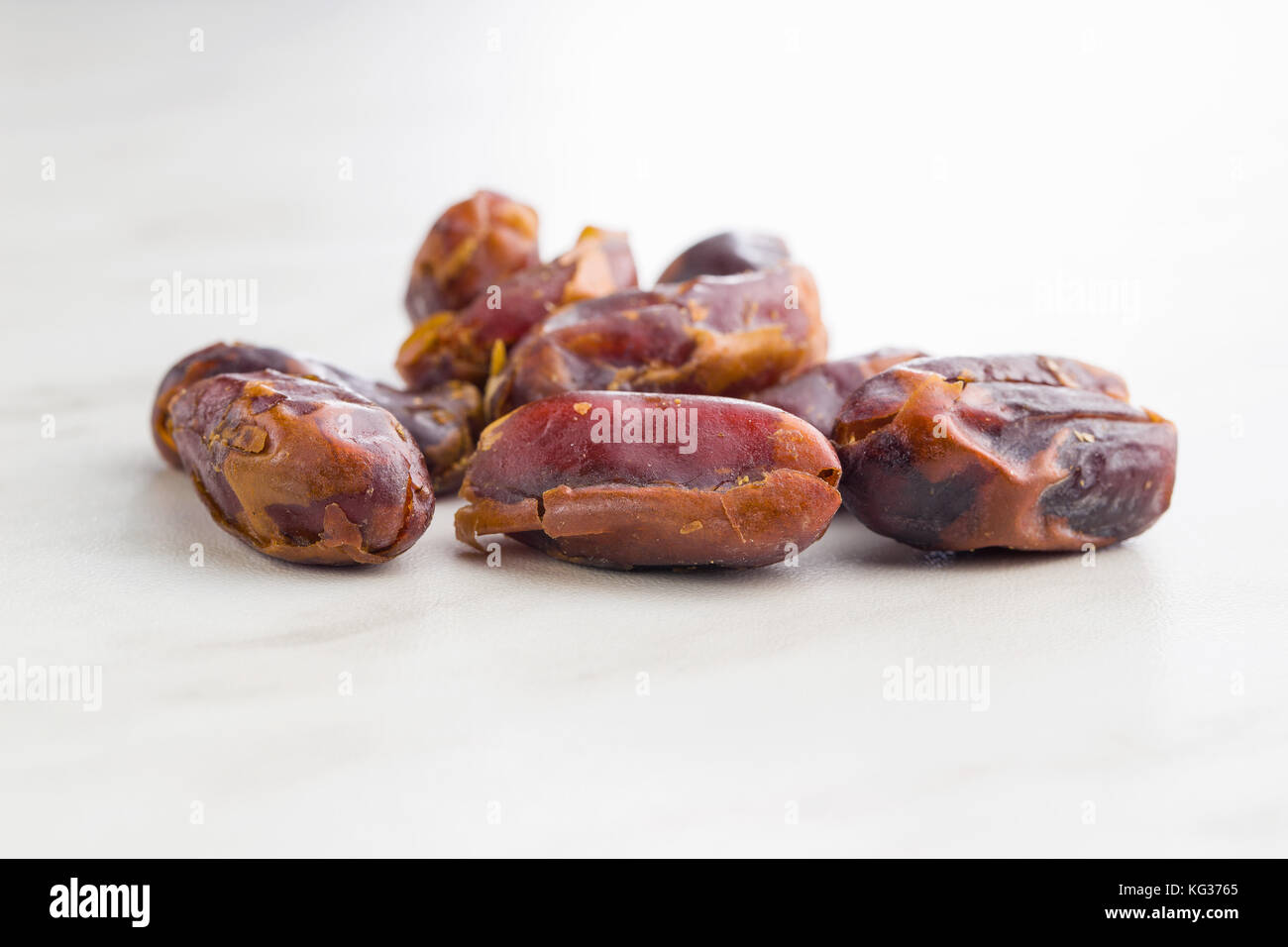 Sweet dates without stones on kitchen table Stock Photo - Alamy