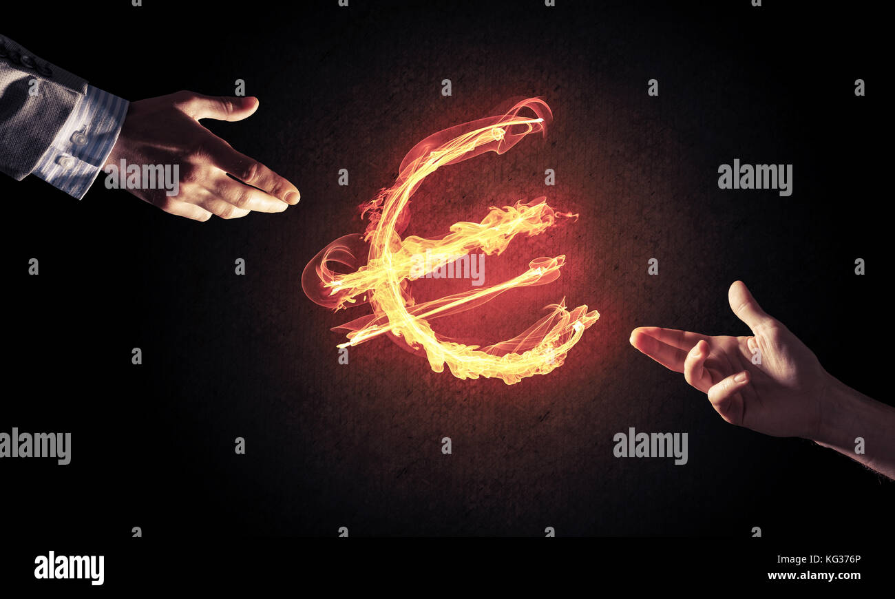 Concept of money making with euro currency fire symbol on dark b Stock ...