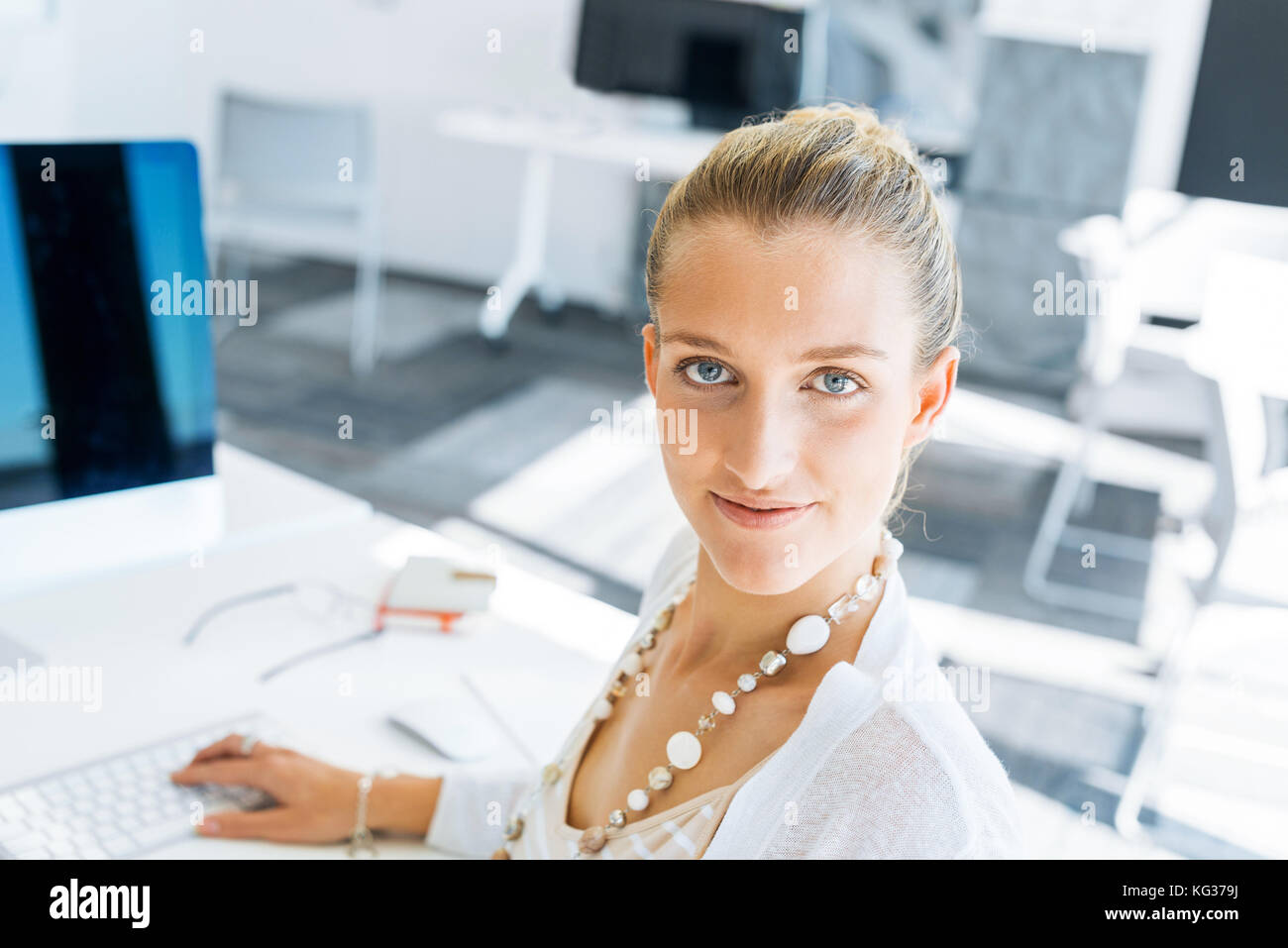 Elegant office worker Stock Photo - Alamy