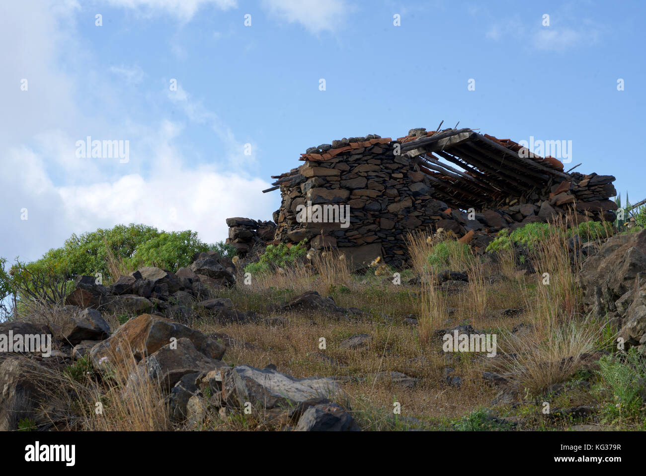 morbid house fallen into ruin on a hill under the blue sky Stock Photo ...
