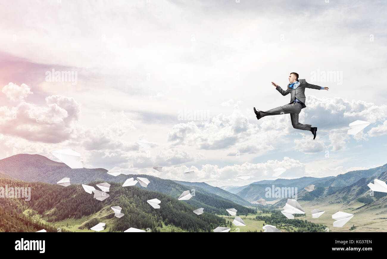 Businessman on the move Stock Photo - Alamy