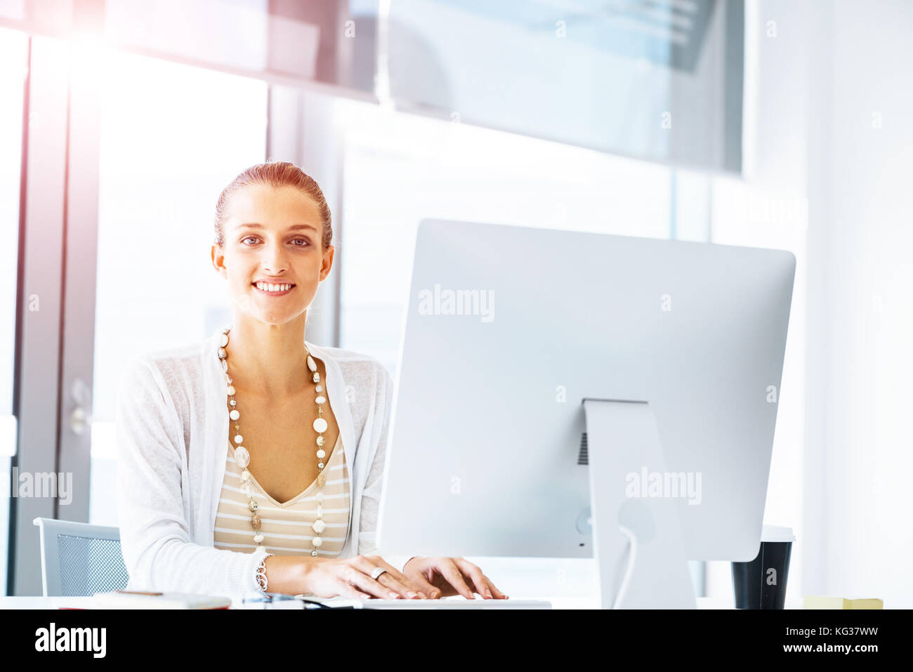 Elegant office worker Stock Photo - Alamy