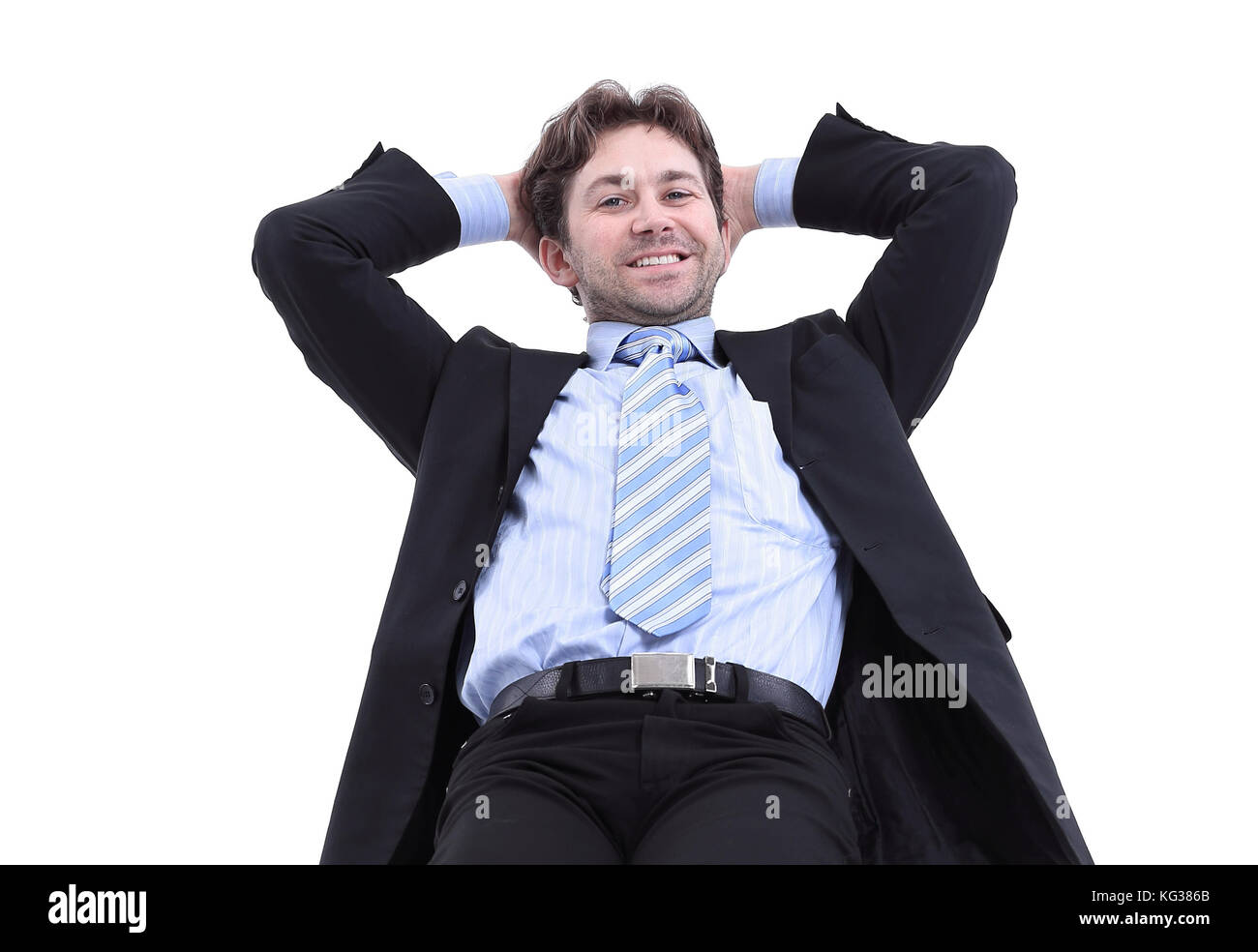 confident businessman relaxes sitting in the chair.isolated on a white ...