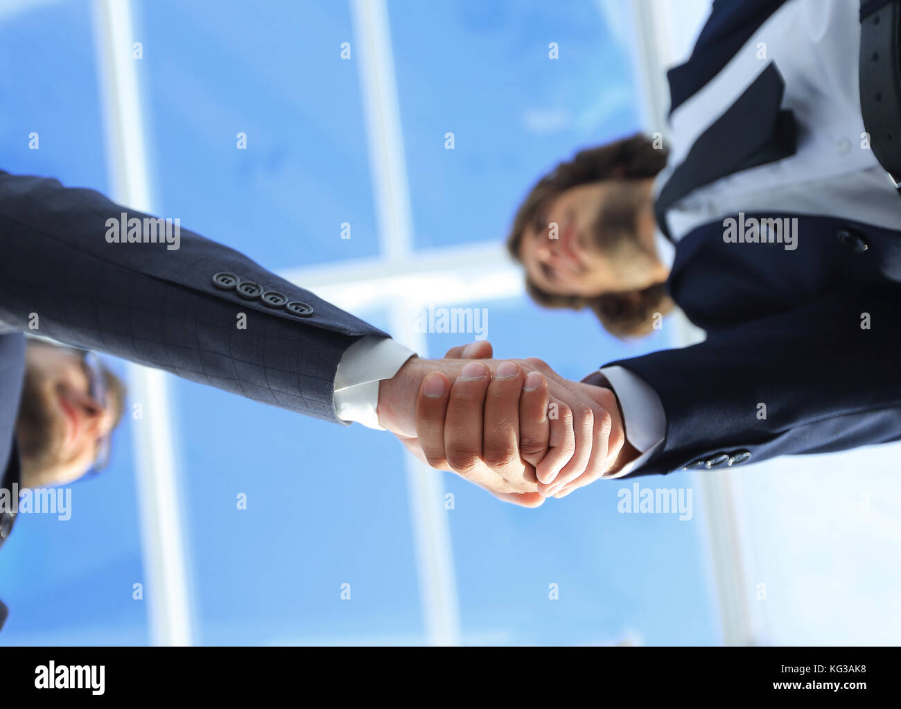 Business men giving a handshake. Business concept Stock Photo - Alamy