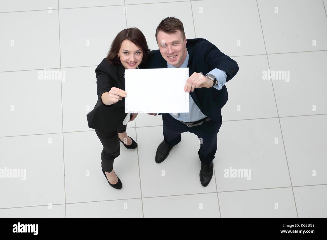 business background. blank sheet in hands at business partners Stock ...