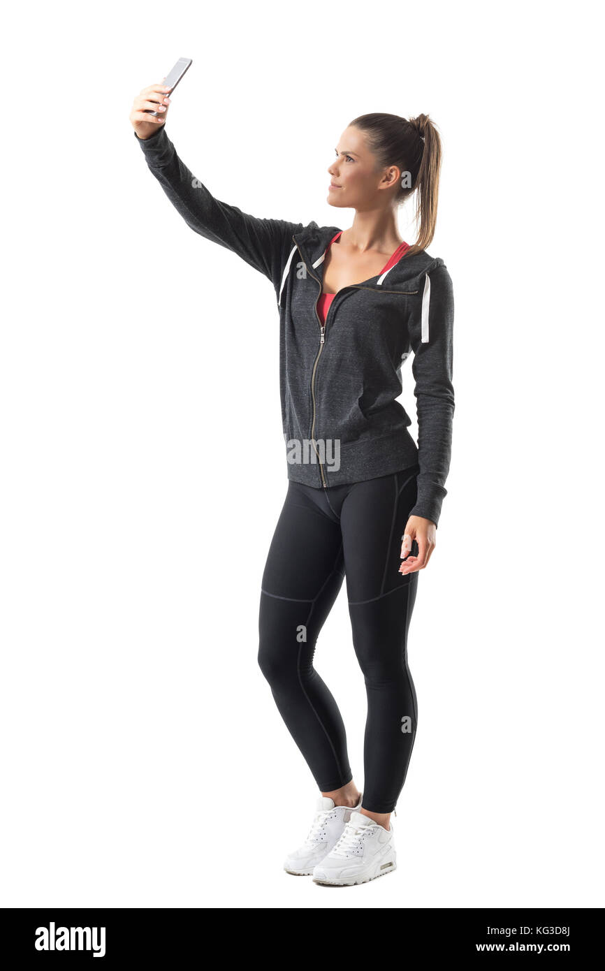 Woman photographing on mobile Cut Out Stock Images & Pictures - Alamy