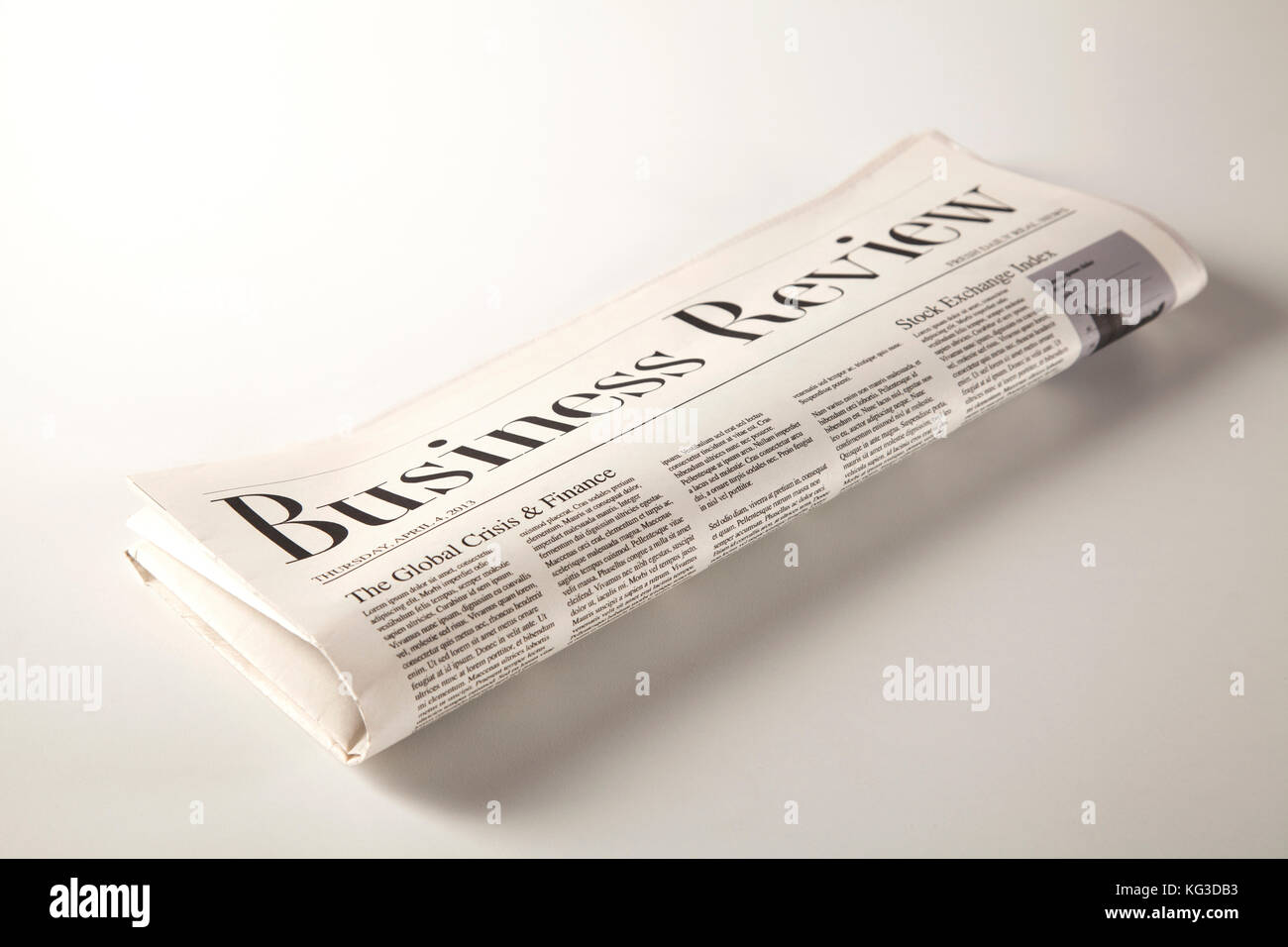 Newspaper on solid ground Stock Photo - Alamy