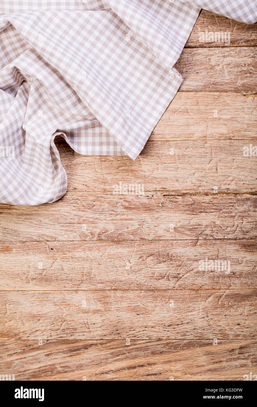 checkered tablecloth on wooden table background Stock Photo - Alamy
