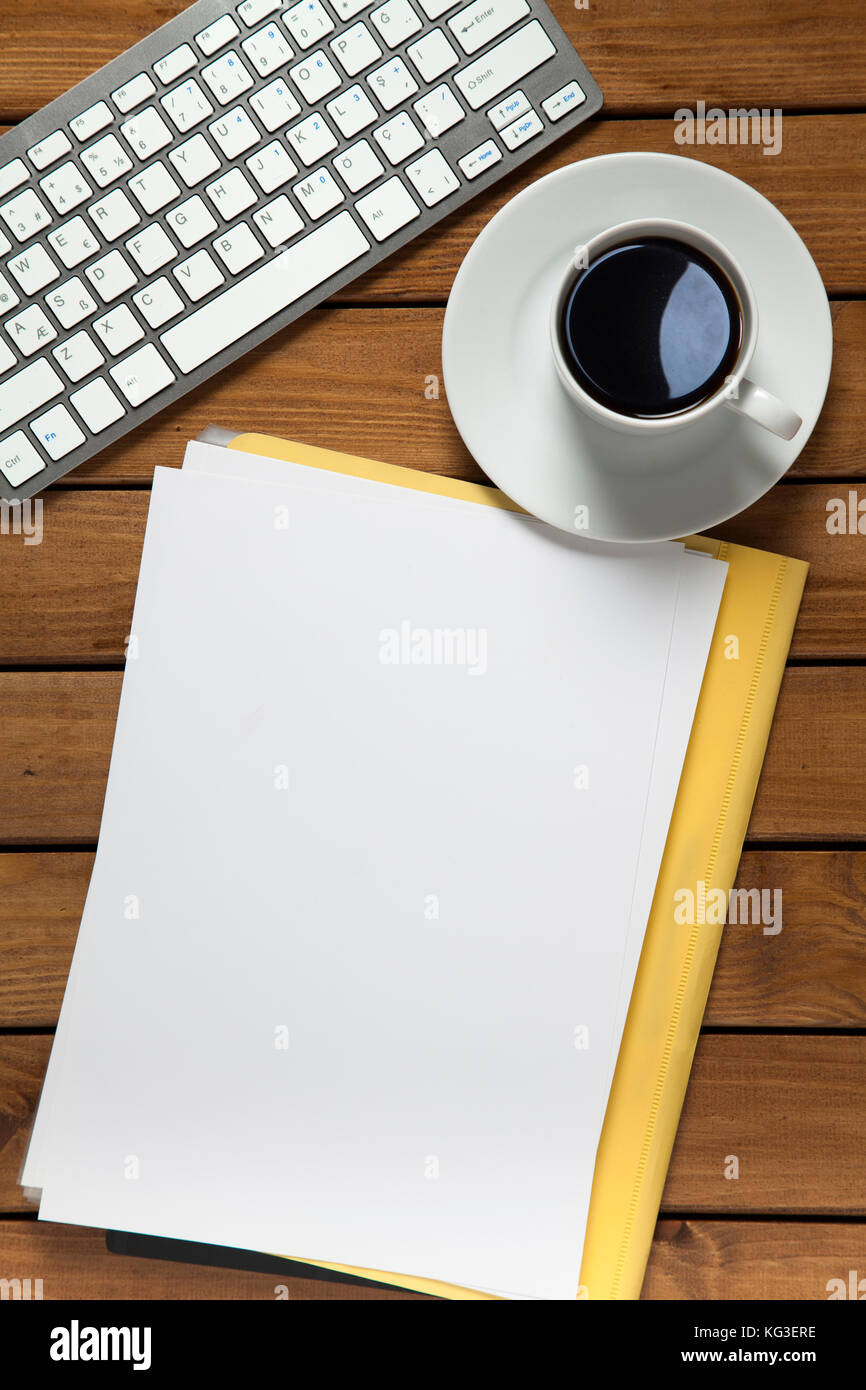Old papers on a wooden table hi-res stock photography and images - Alamy