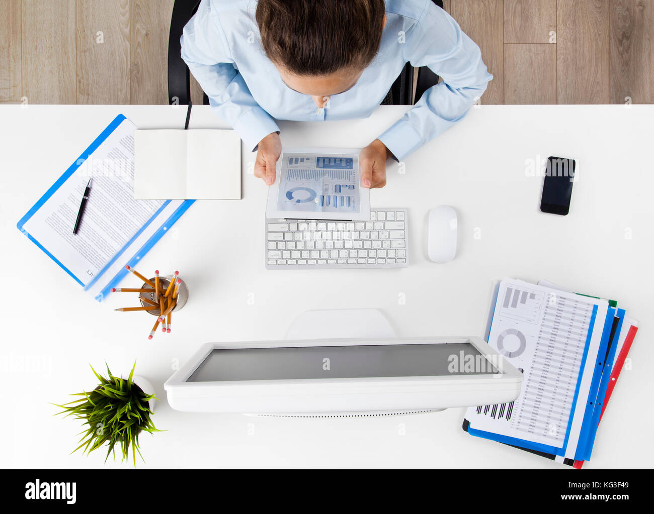 Overhead View Of Businesswoman Working At Computer In Office Stock ...