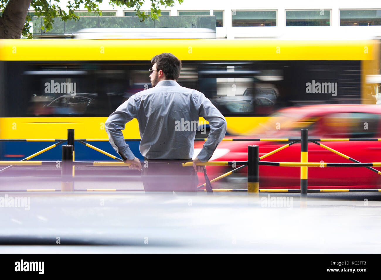 Man at bus stop hi-res stock photography and images - Alamy