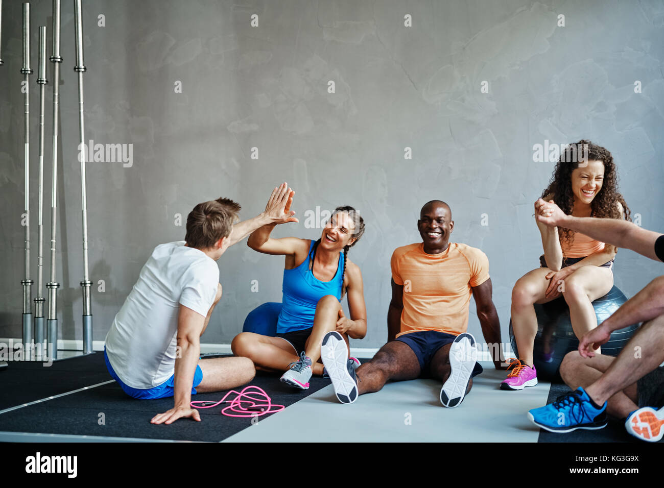 Exercising together high five hi-res stock photography and images - Alamy