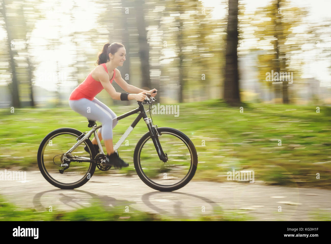 Girl having fun riding bicycle hi-res stock photography and images - Alamy