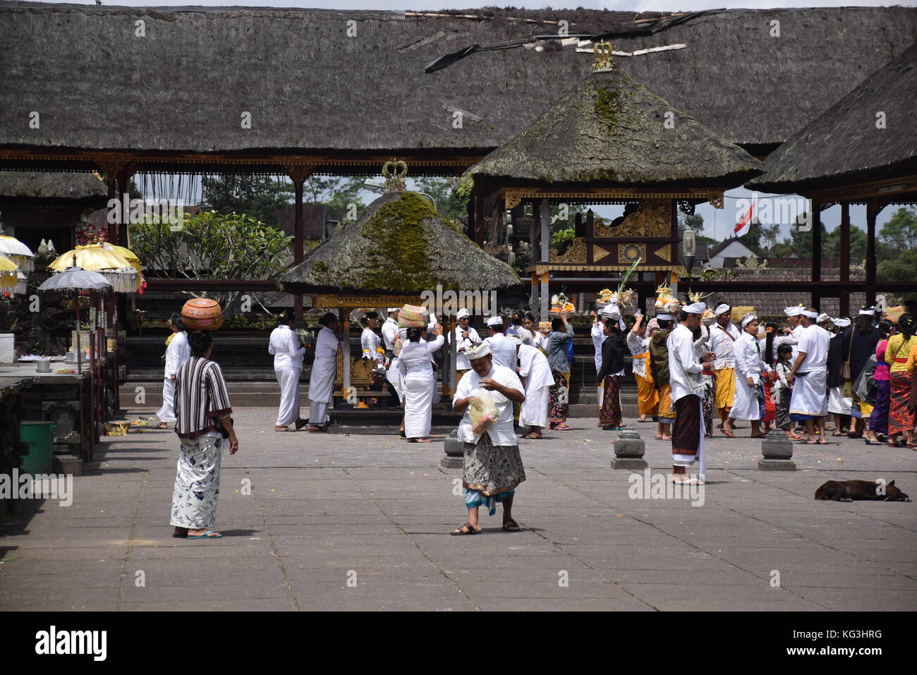 Balinese people pray inside Pura Besakih mother hindu temple in Bali ...