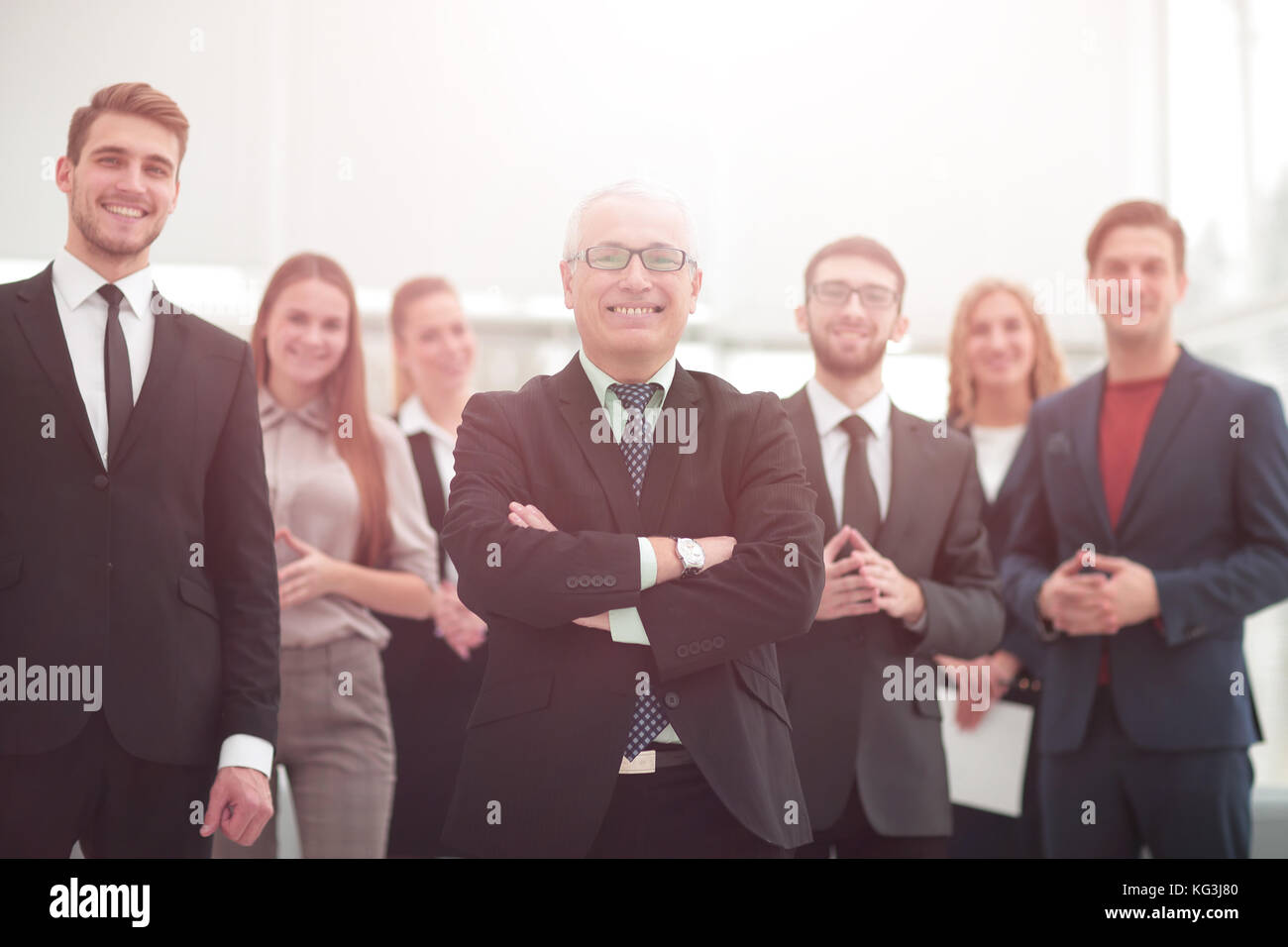 The team of the successful people with their boss Stock Photo - Alamy