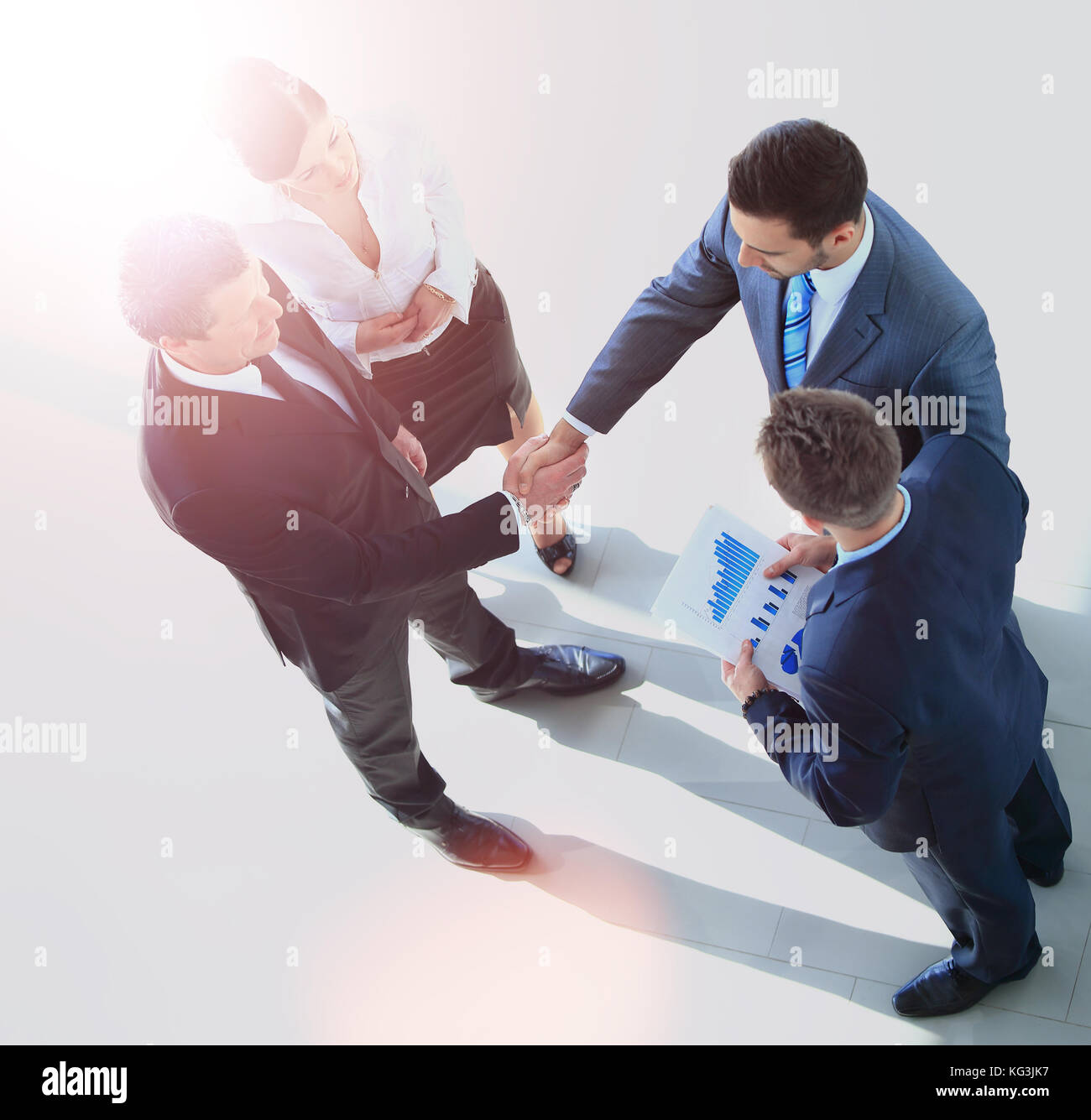 Top view of a successful business leaders finalizing a deal at office ...