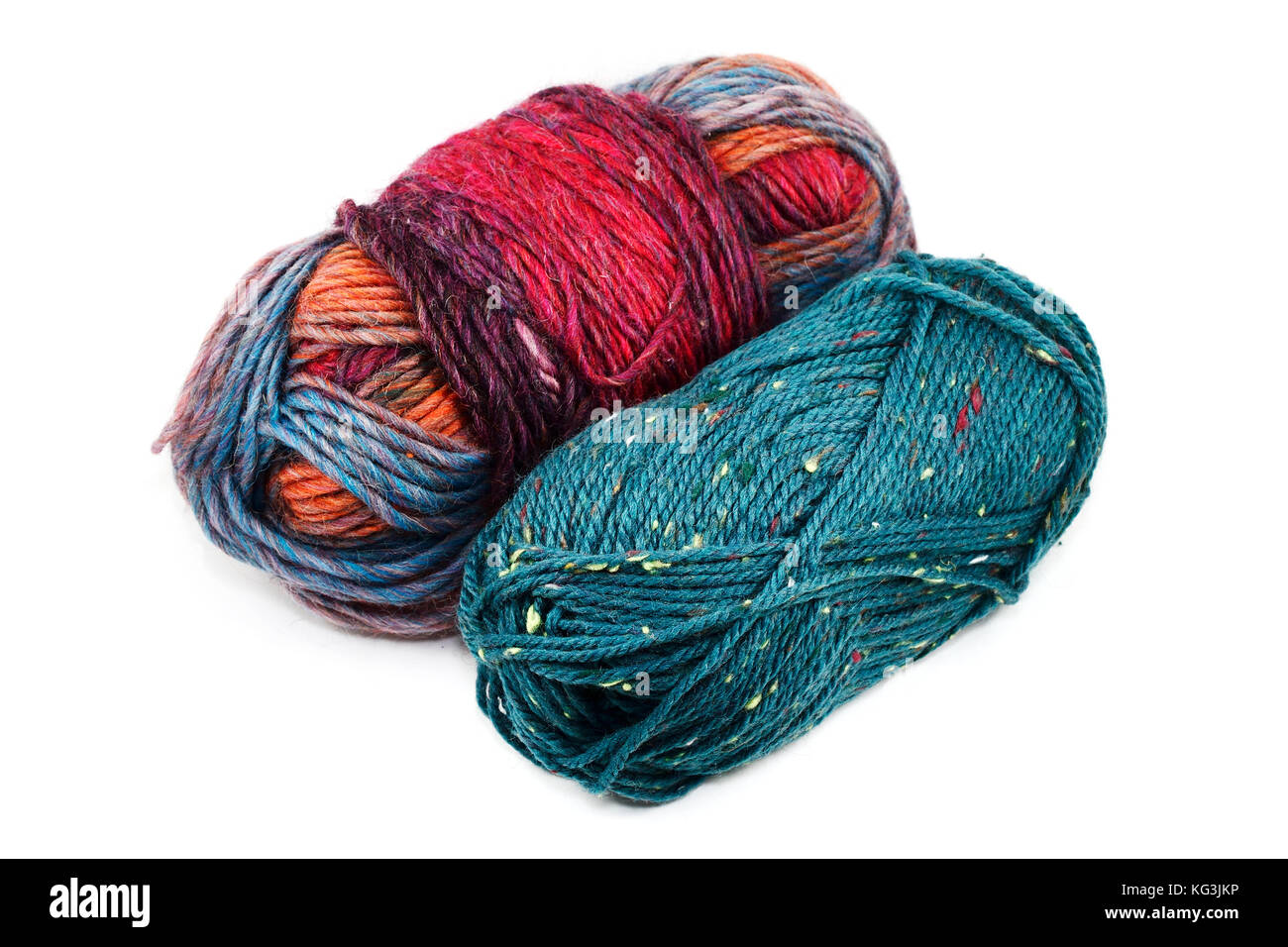two coils of colorful wool on white background Stock Photo - Alamy